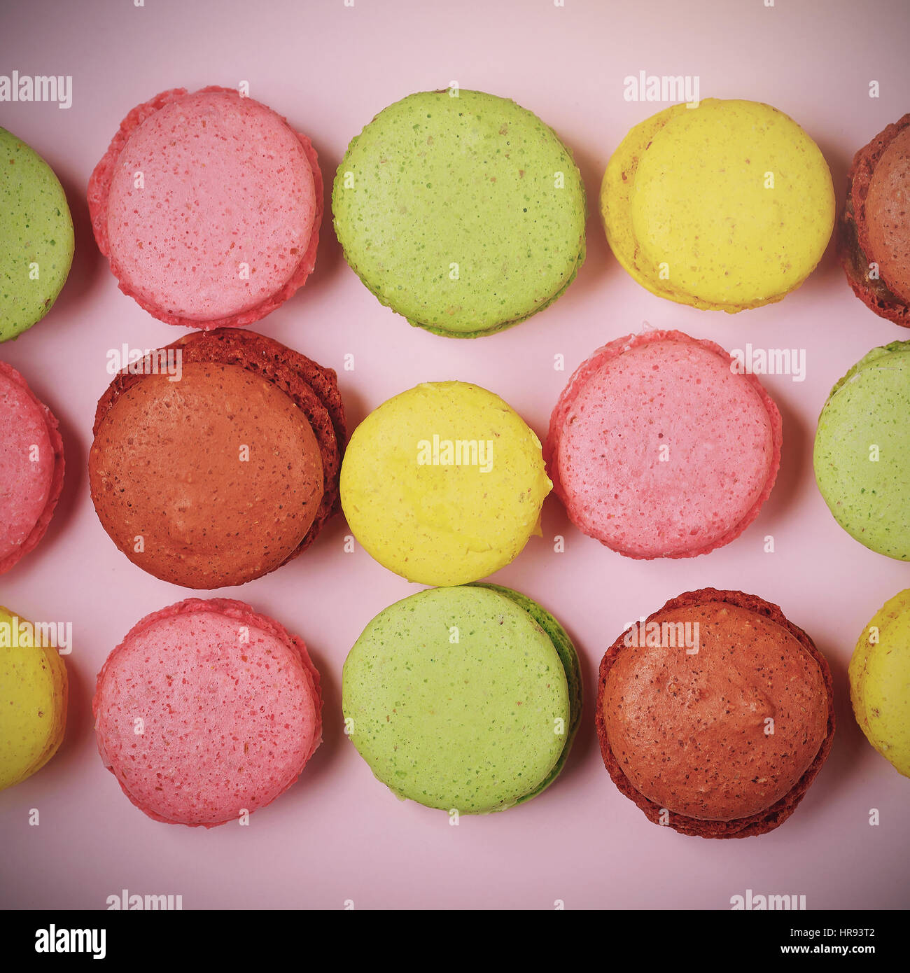 colorful macaroons on the pink background Stock Photo - Alamy