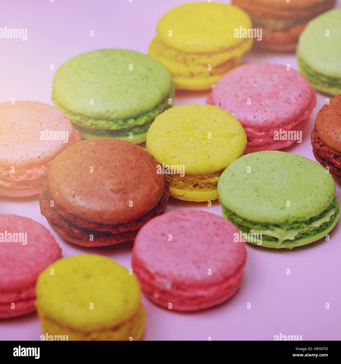 colorful macaroons on the pink background Stock Photo - Alamy