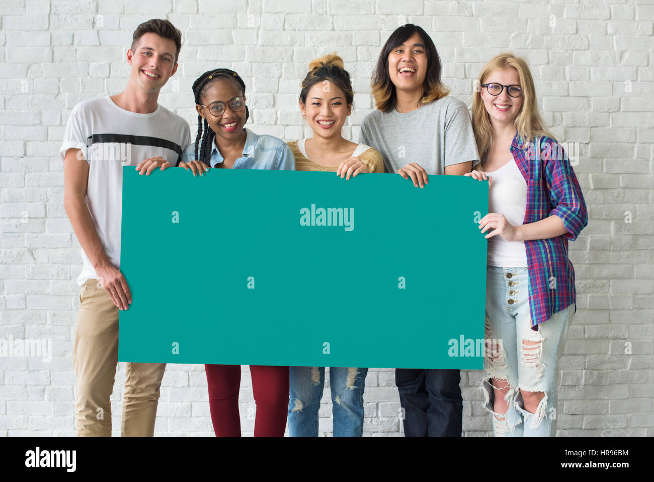 Group of Friends Holding Blank Banner Stock Photo - Alamy
