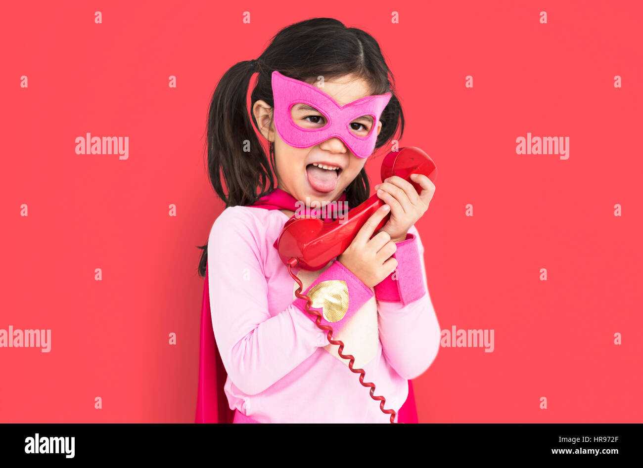 Superhero Girl With Telephone Concept Stock Photo - Alamy