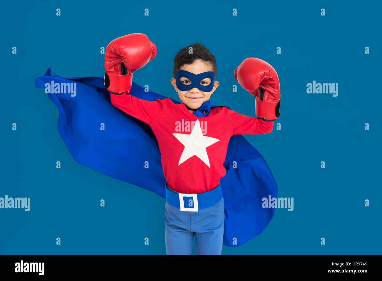 Superhero Kid Mighty Strength Concept Stock Photo - Alamy