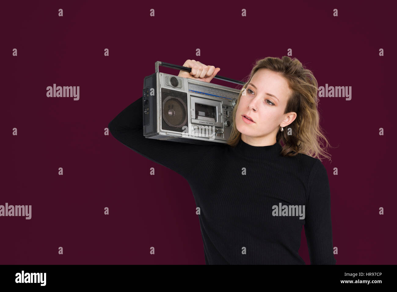 Caucasian Lady Holding Jukebox Neutral Stock Photo - Alamy