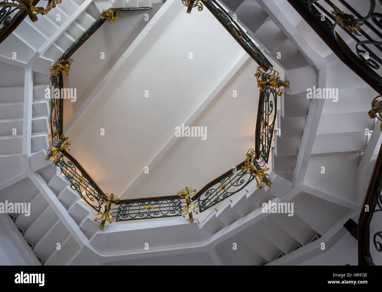 A spiral staircase observation tower view from below. The staircase ...