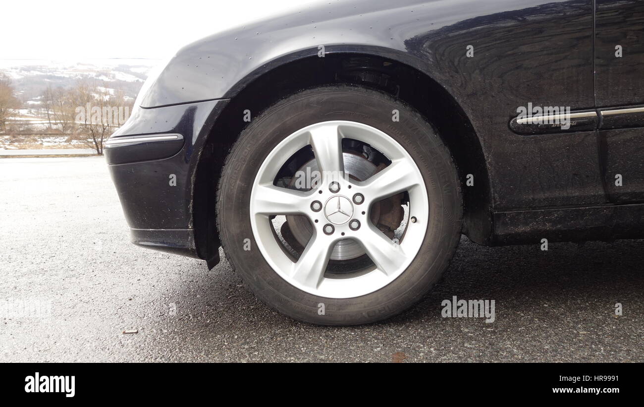 Alloy wheels with tires mounted on. Close-up photo of profile model ...