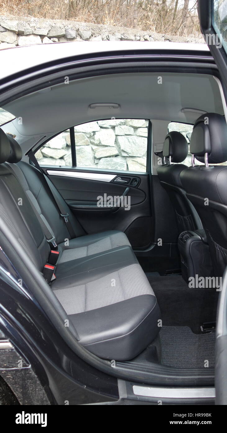 Mixed leather and textile upholstery car interior, big navigation ...