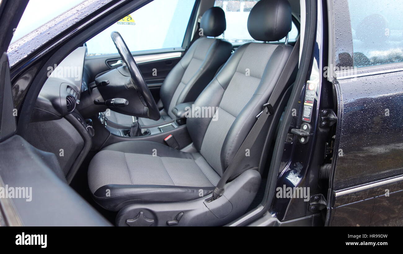 Mixed leather and textile upholstery car interior, big navigation ...