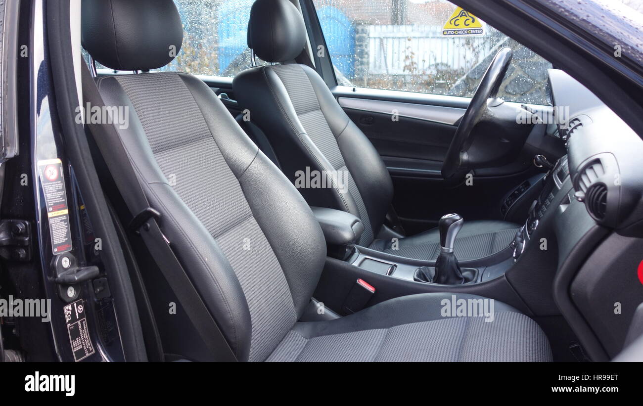Mixed leather and textile upholstery car interior, big navigation ...