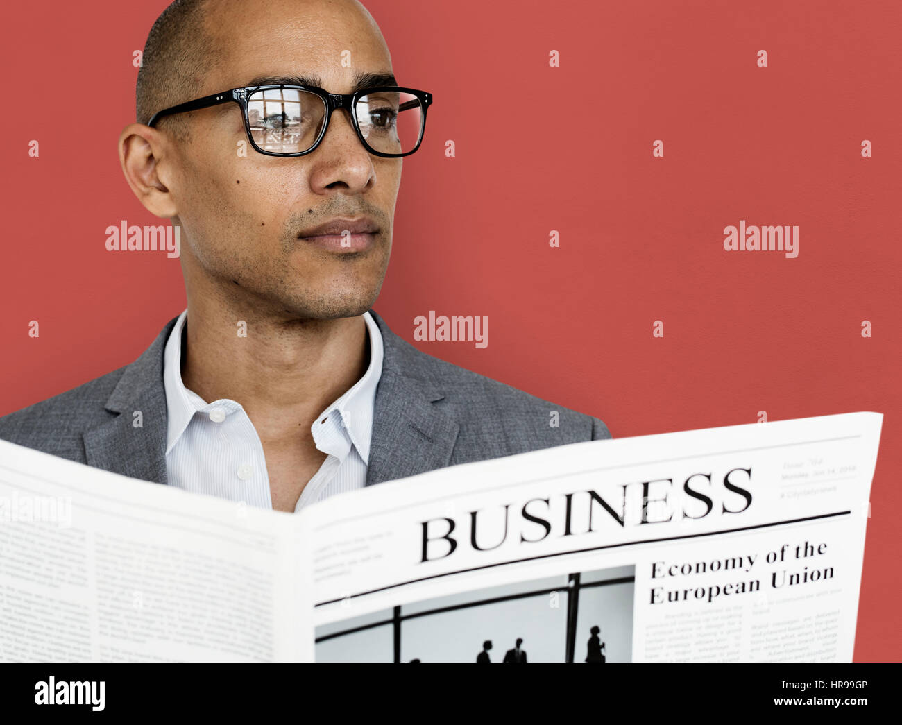African Descent Business Man Newspaper Concept Stock Photo - Alamy
