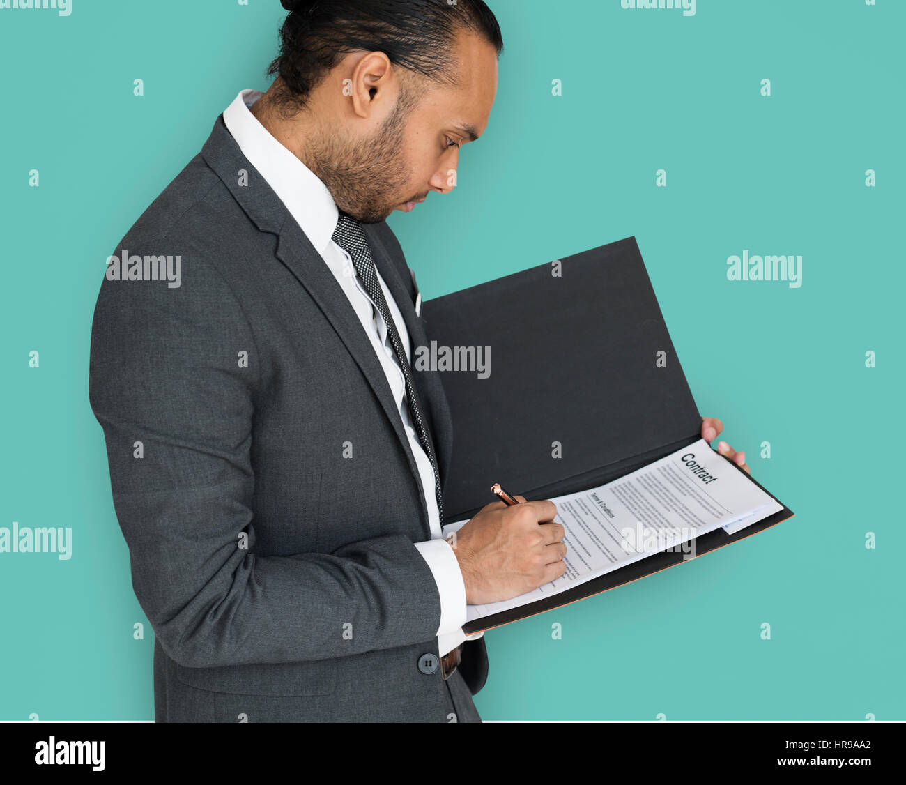 Indian Asian Man Signing Contract Stock Photo - Alamy