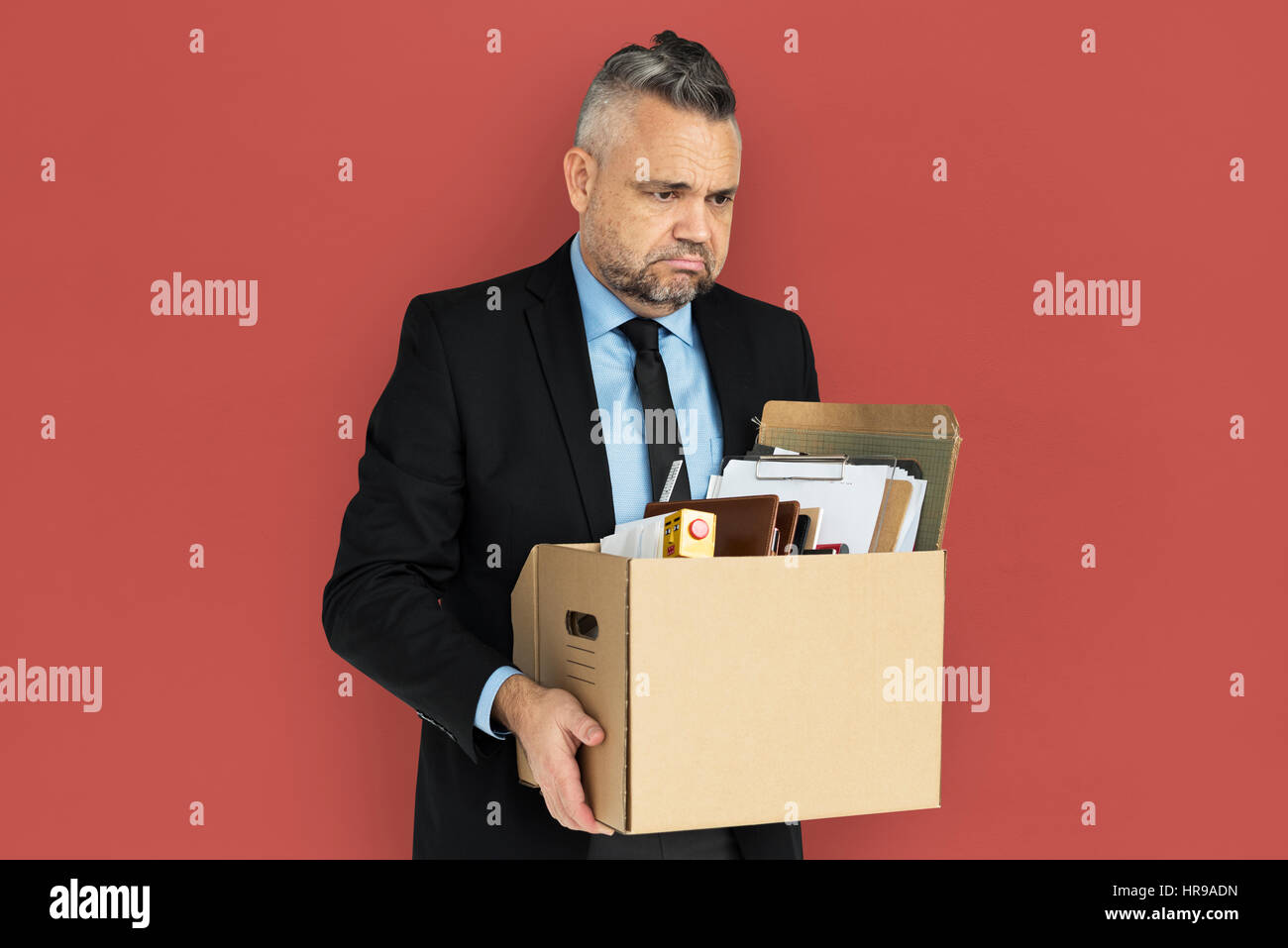 Caucasian Man Holding Box Sad Stock Photo - Alamy
