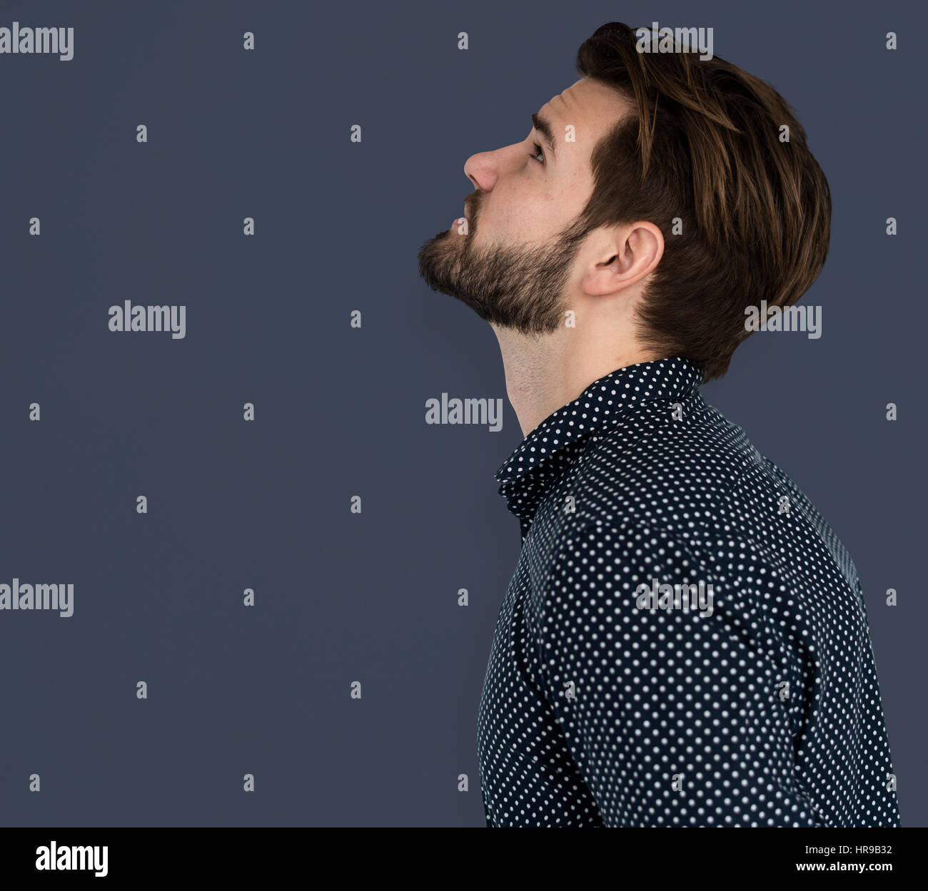 Man Curious Thinking Look up SIde View Portrait Stock Photo - Alamy