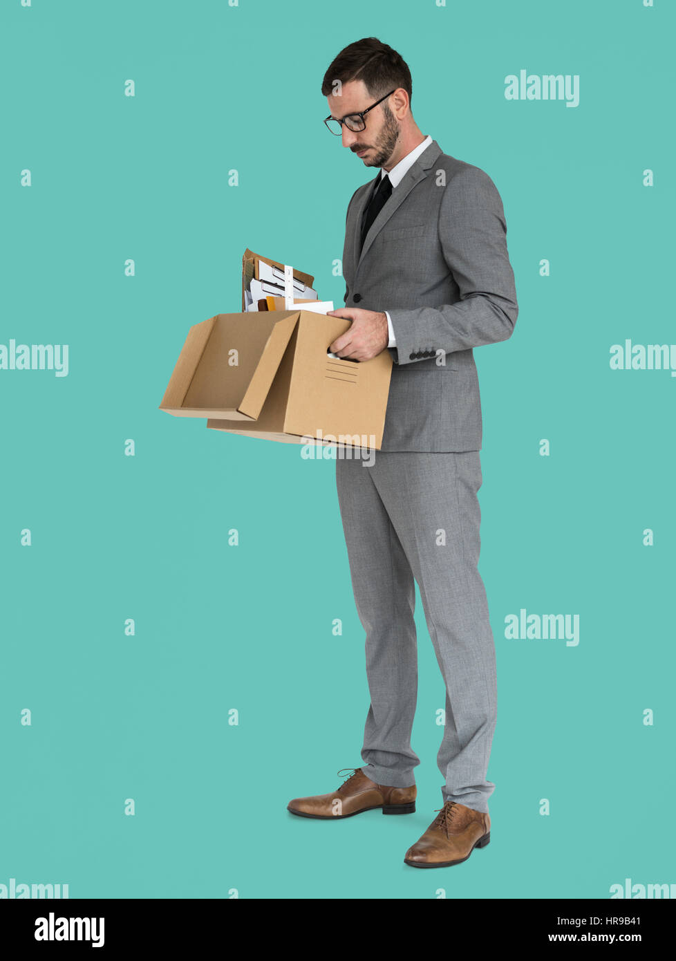 Caucasian Business Man Pack Up Retrenched Stock Photo - Alamy