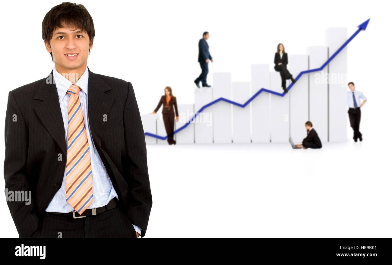 business man in front of a group of business people with a chart ...