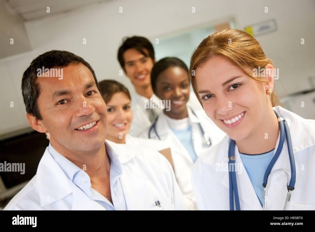 Group of friendly doctors at a hospital Stock Photo - Alamy