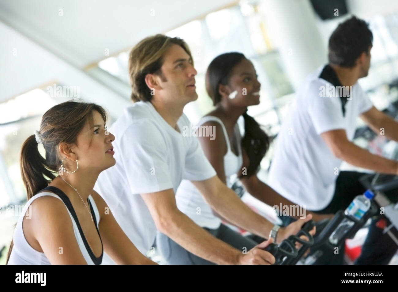 group of people doing spinning in a gym Stock Photo - Alamy