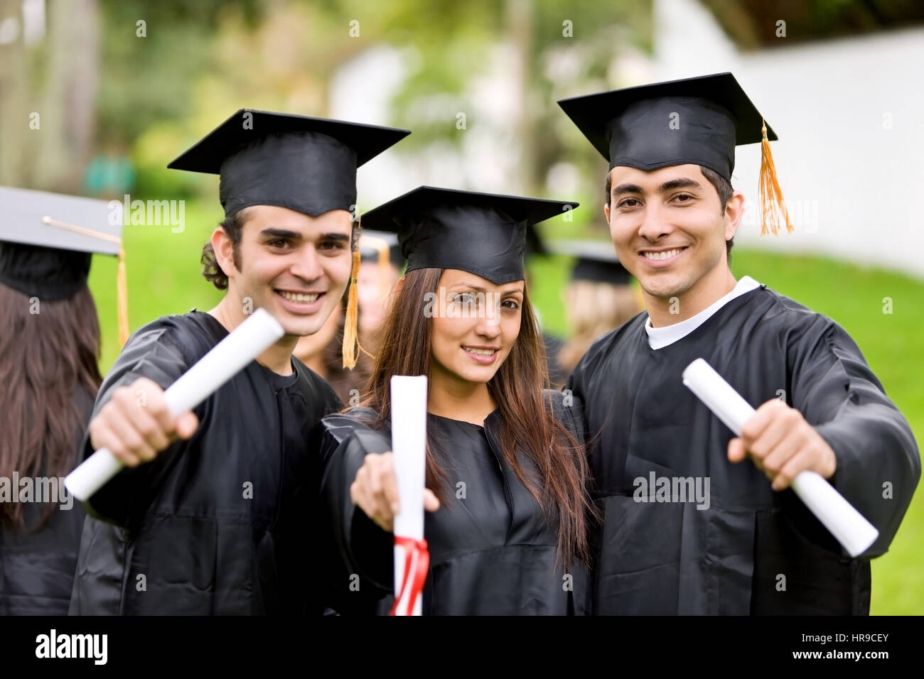 group of graduation students looking very happy Stock Photo - Alamy