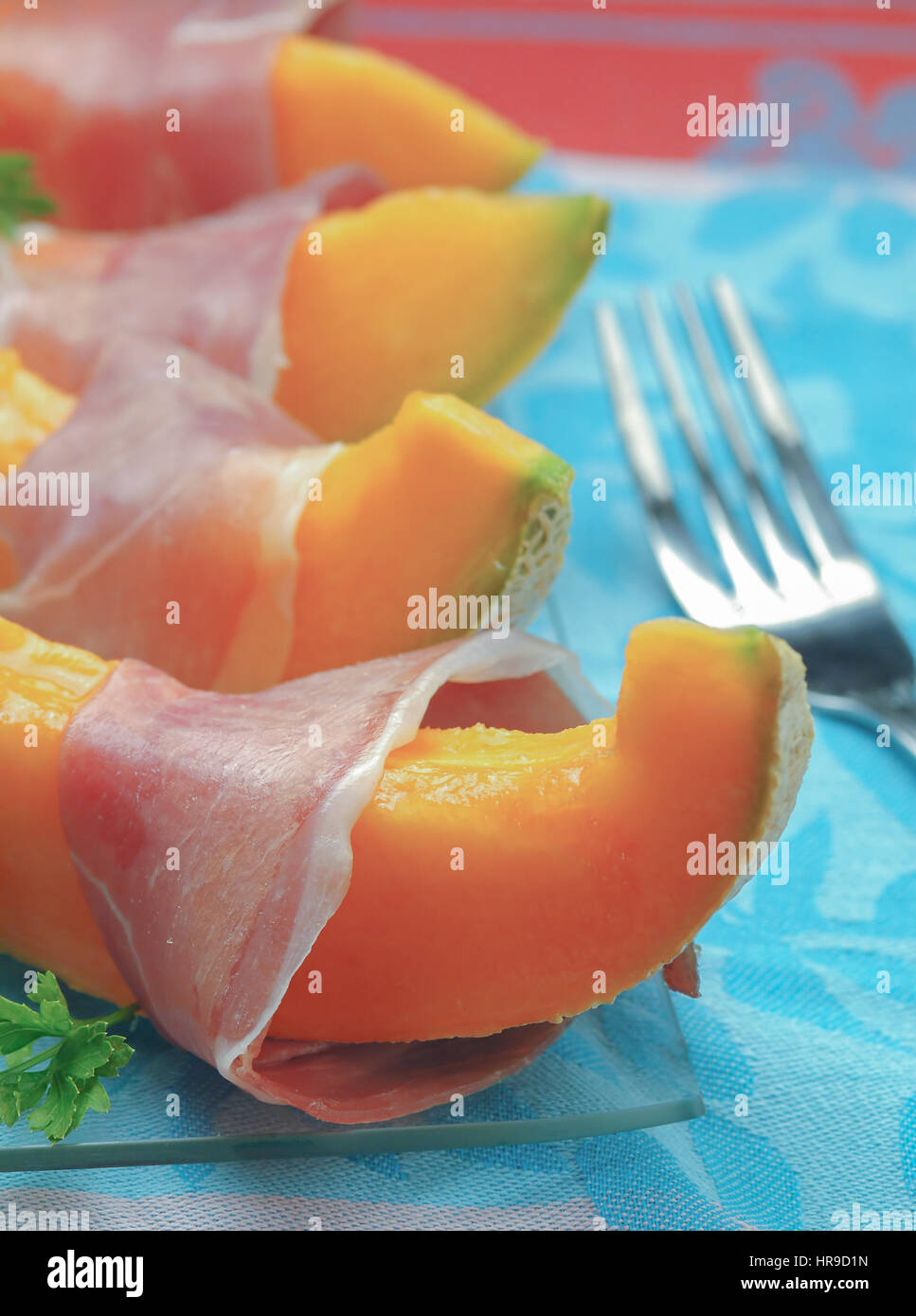 Ham and fresh melon closeup Stock Photo - Alamy