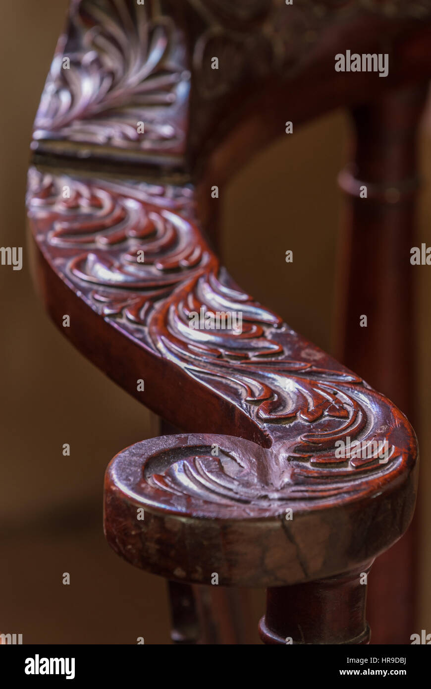 Ornately carved arm of a chair Stock Photo - Alamy