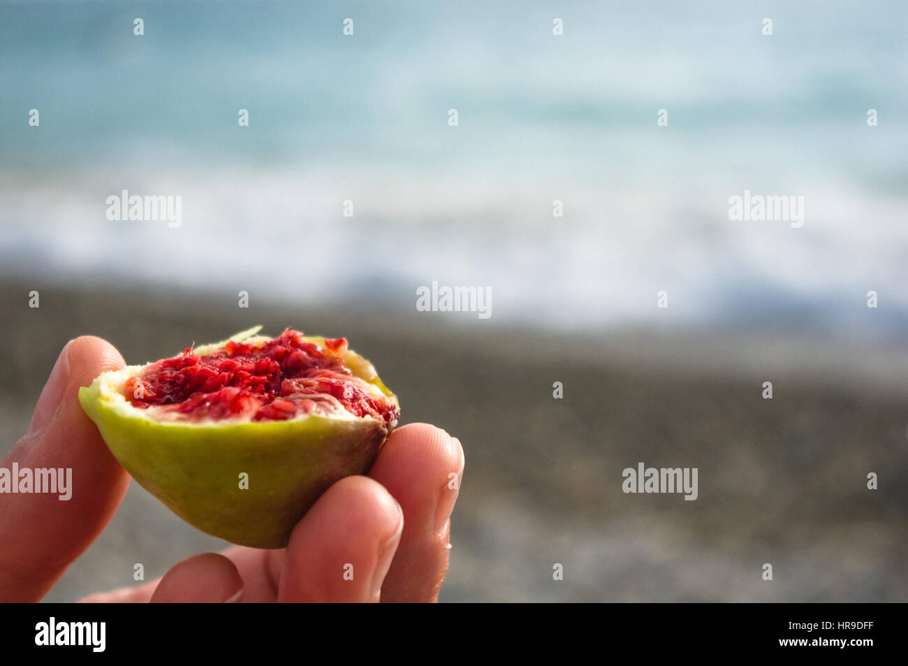 Figs in hand hi-res stock photography and images - Alamy