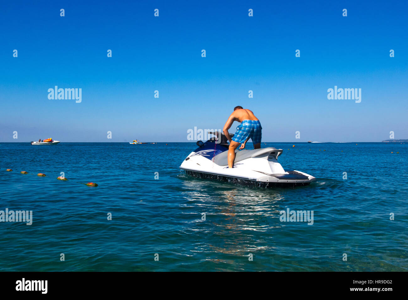 Man riding a jet ski hi-res stock photography and images - Alamy