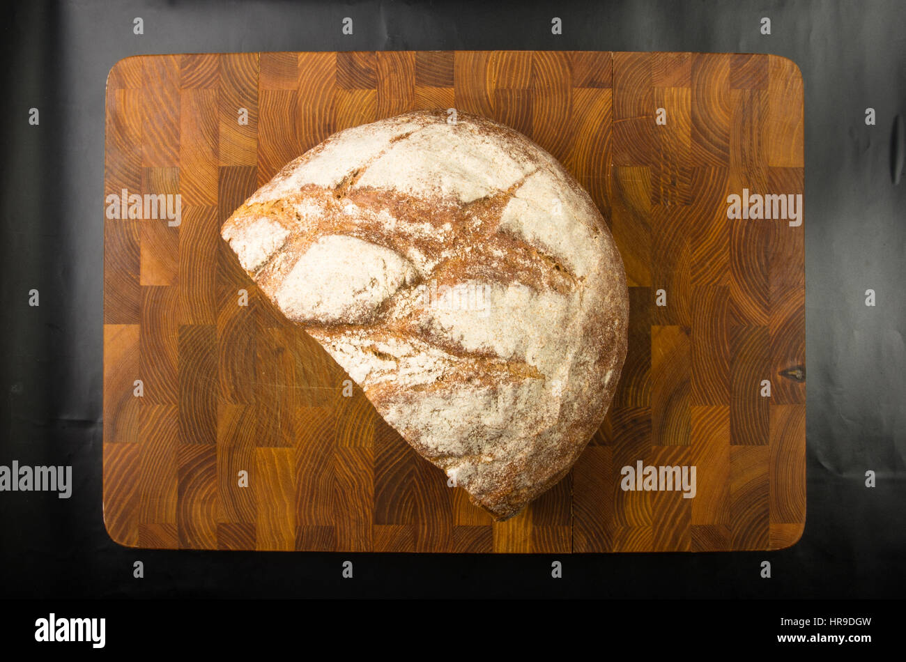 cut malt bread handmade on wooden background Stock Photo - Alamy