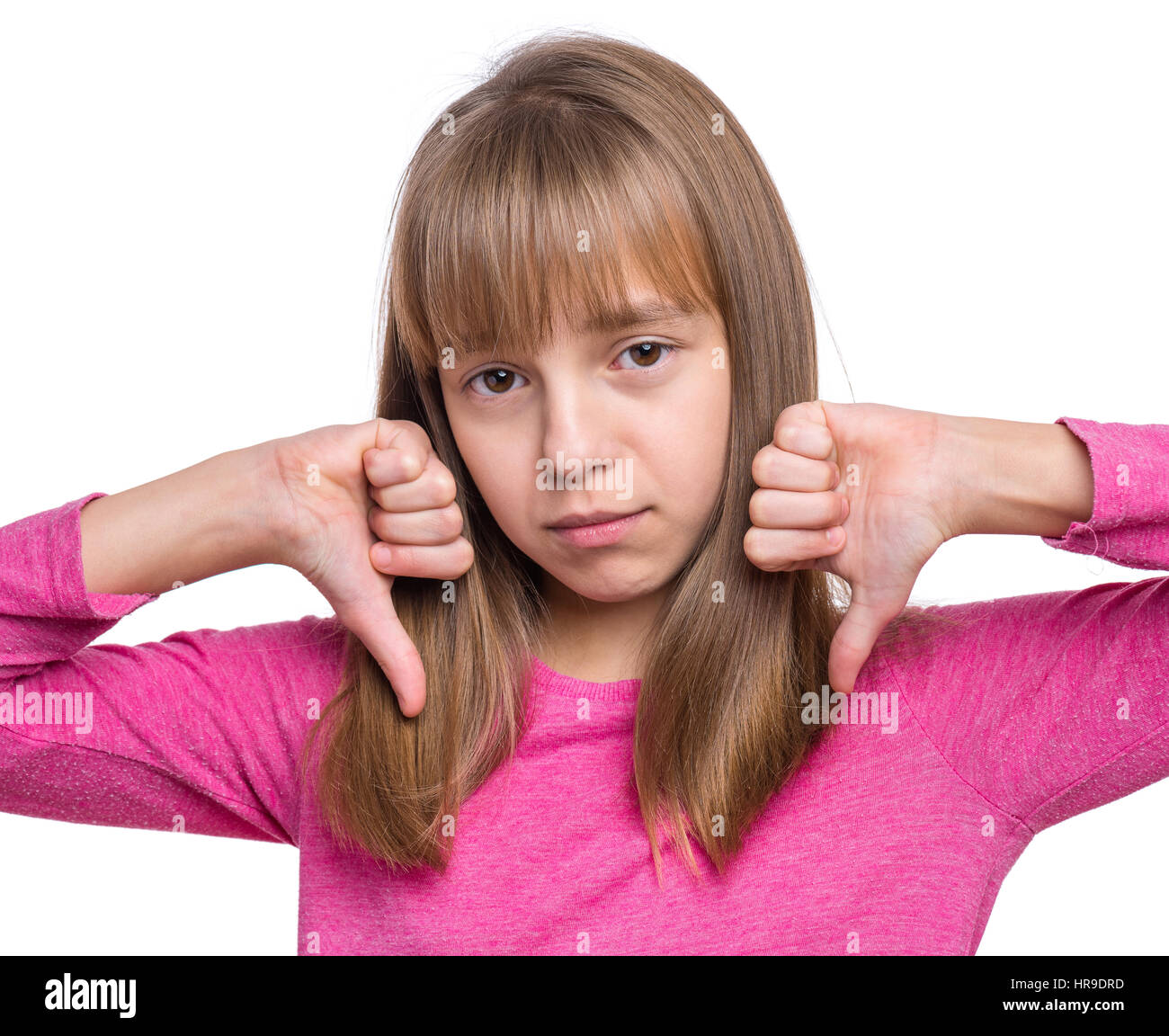 Close up emotional portrait of caucasian unhappy girl giving thumbs ...