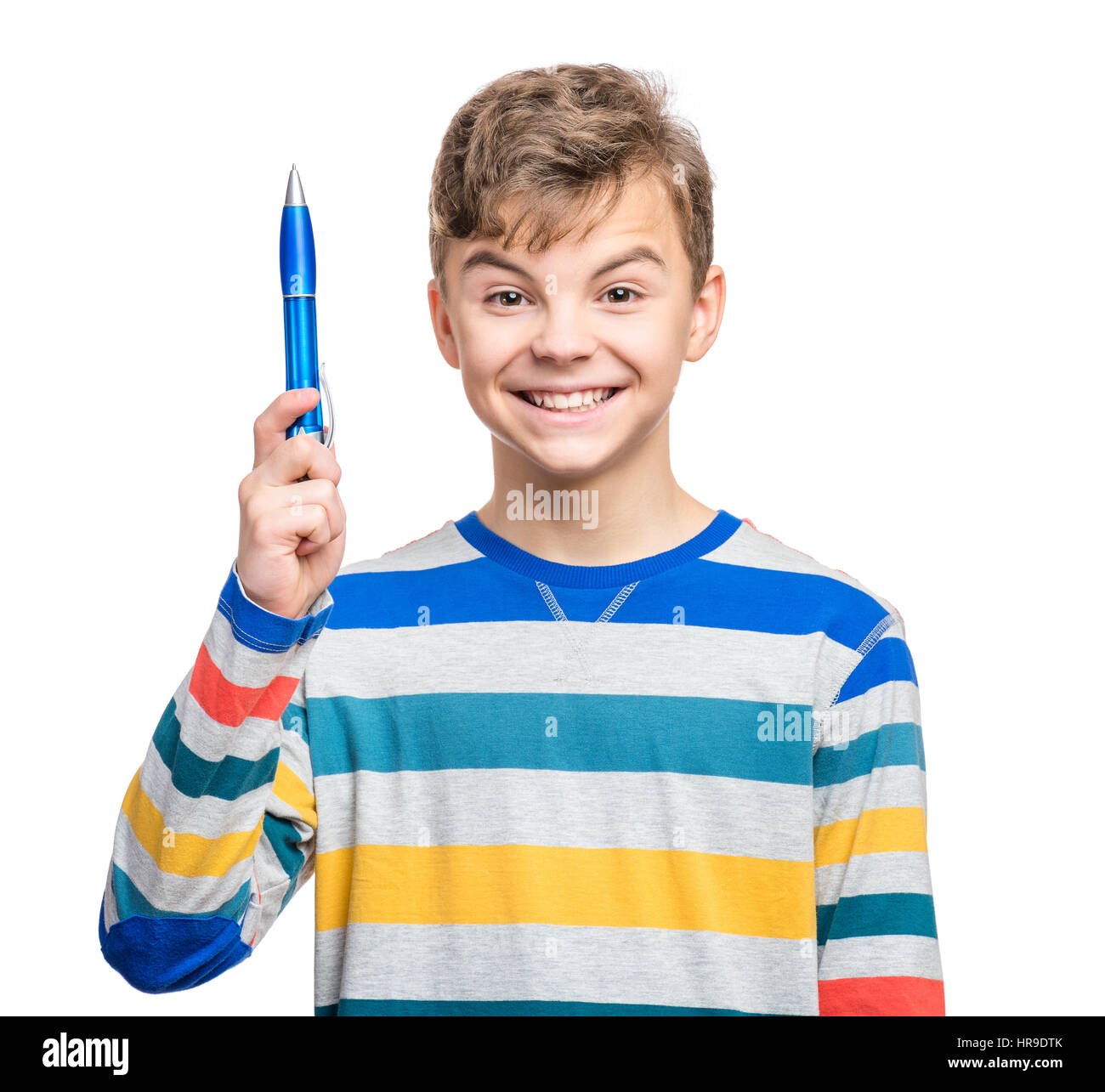 Portrait of caucasian smiling teen boy with blue pen. Handsome funny teenager looking at camera ...