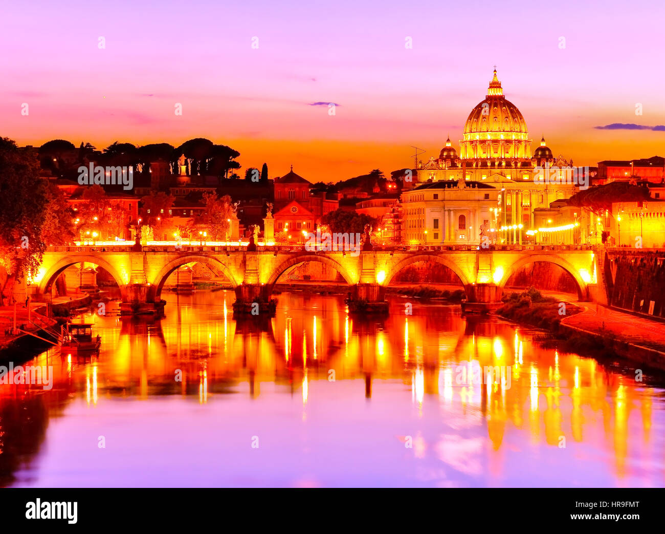View of St. Peter's Basilica and Aelian Bridge at dusk in Rome Stock ...