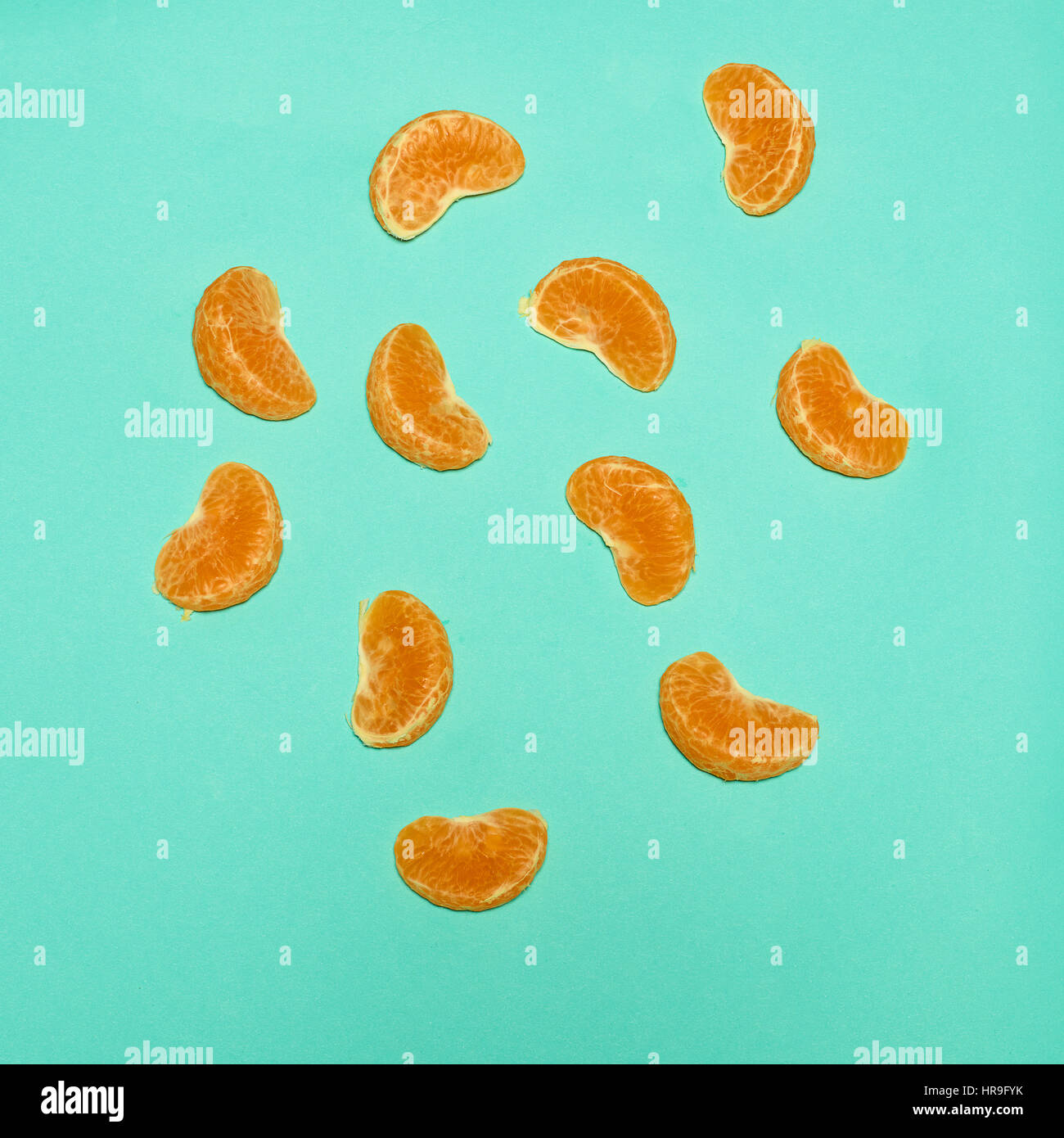 Ripe Mandarin fruit peeled open Stock Photo - Alamy