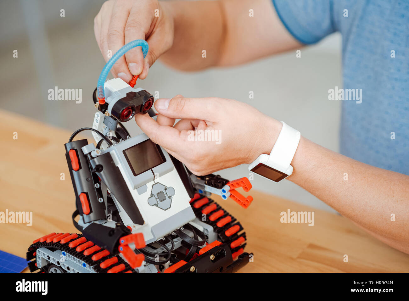 Professioanl engineer testing robot Stock Photo - Alamy