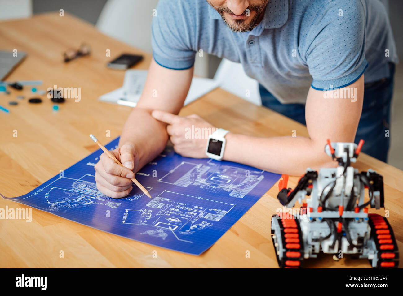 Professional engineer constructing robot Stock Photo - Alamy