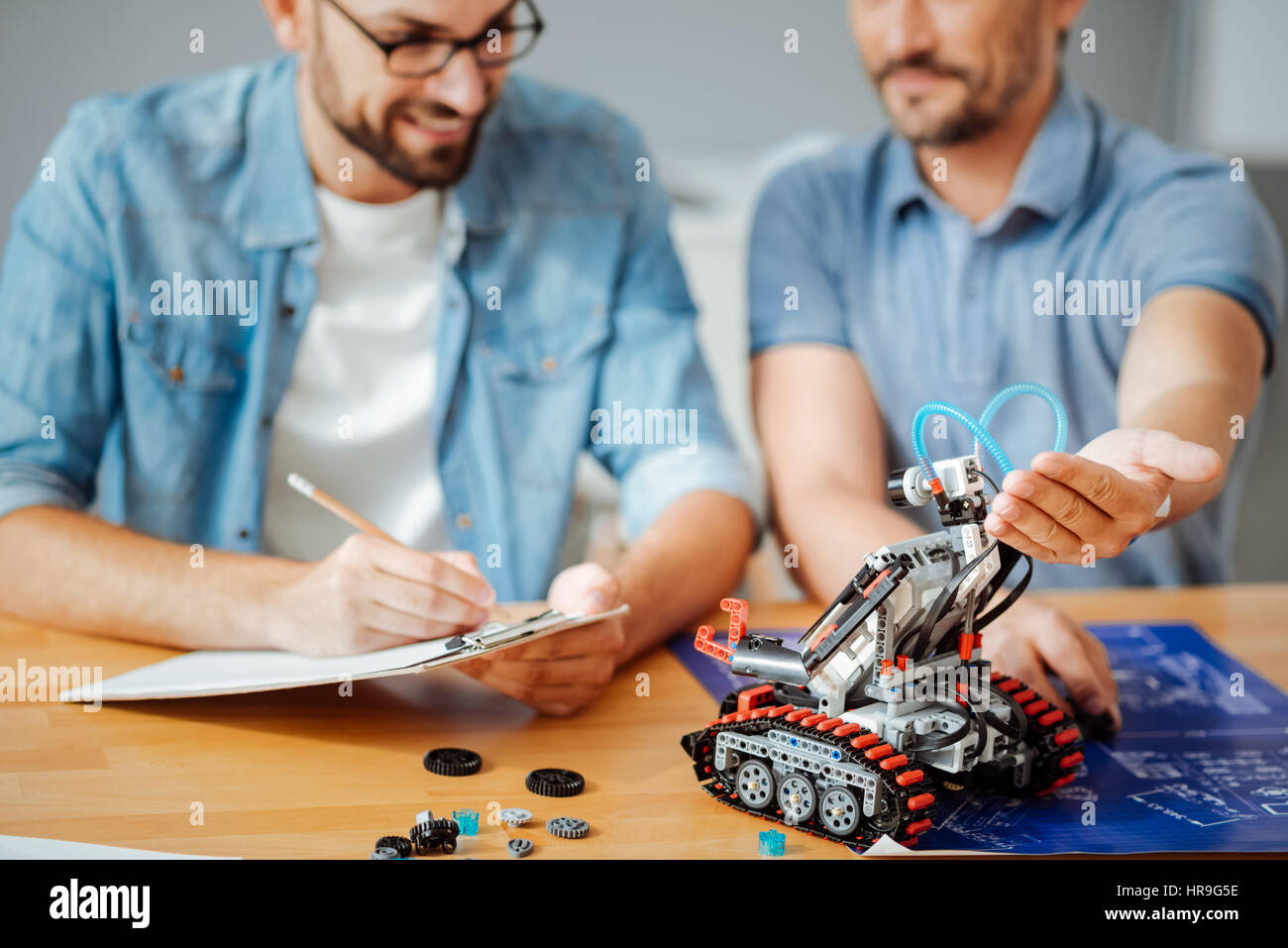 Professional engineers testing the robot Stock Photo - Alamy