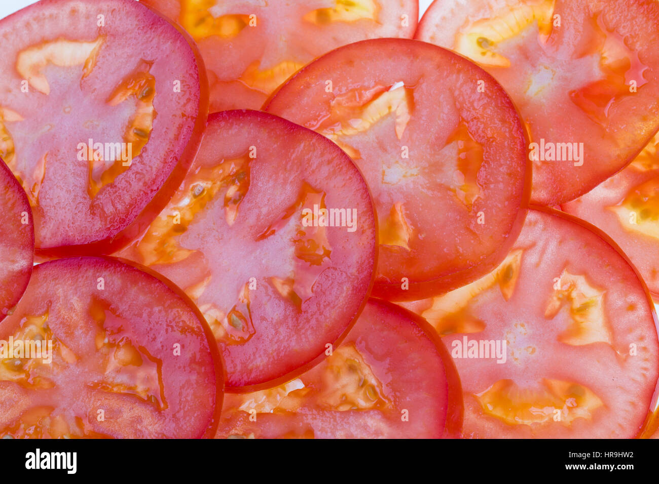 Fresh red tomatoes slices Stock Photo - Alamy