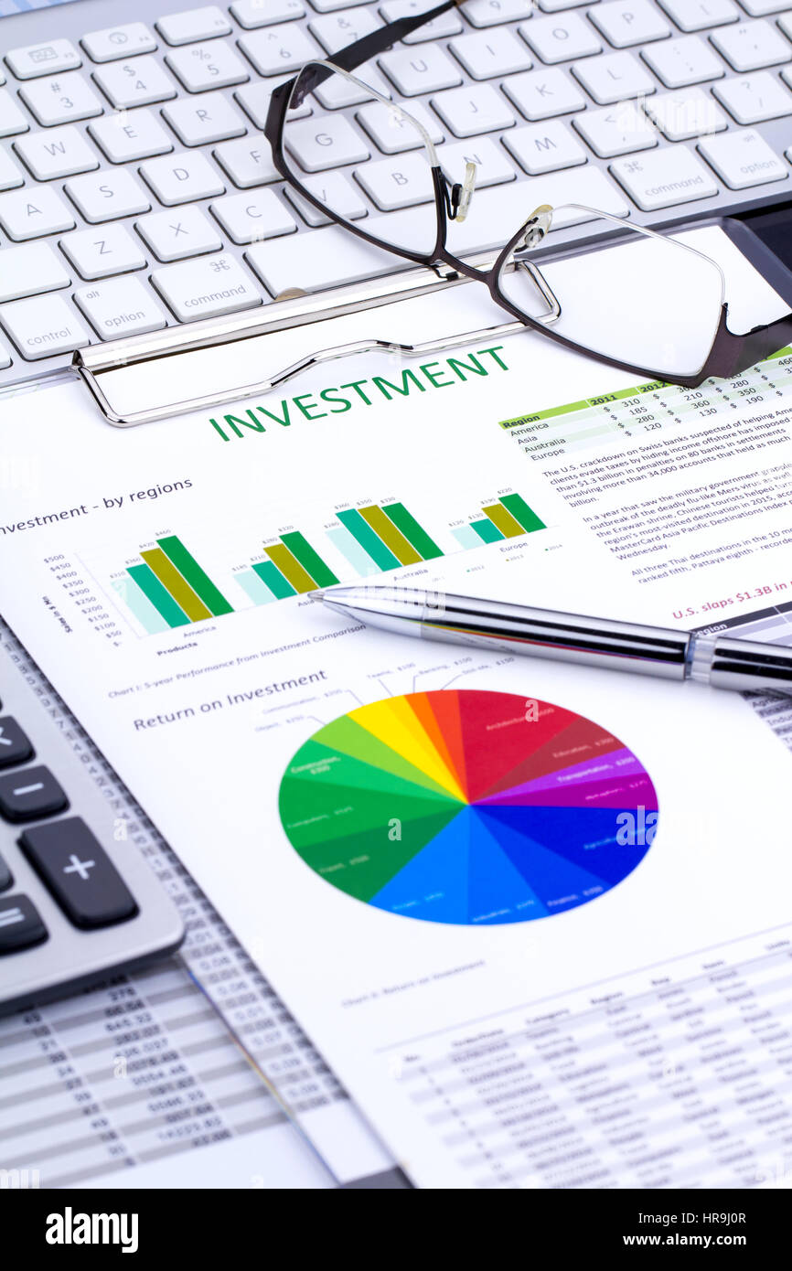 Investment analysis with colorful chart Stock Photo - Alamy