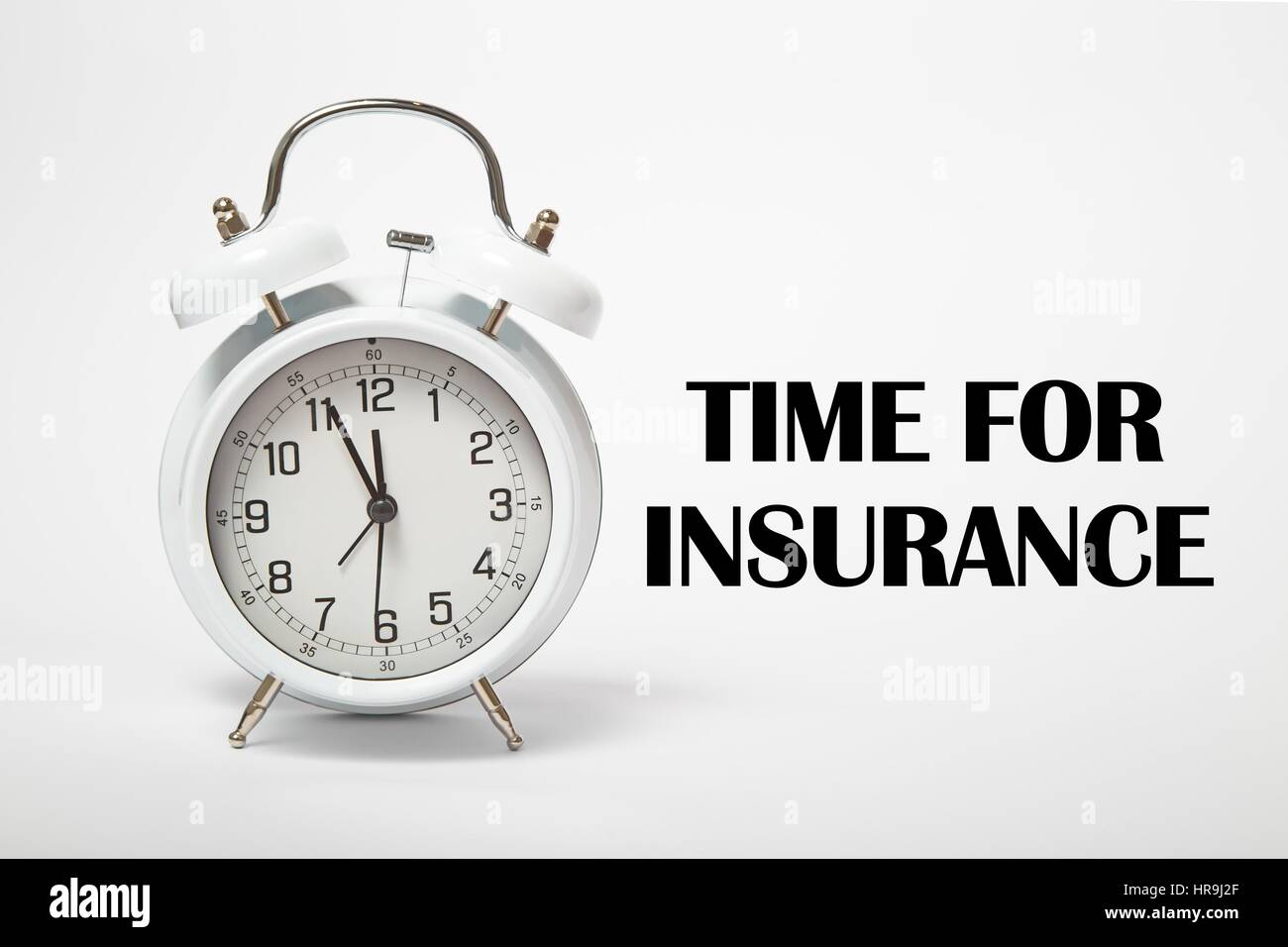 White old clock with text TIME FOR INSURANCE Stock Photo - Alamy