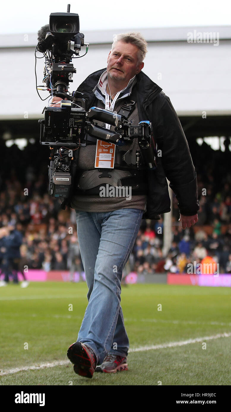 A television cameraman Stock Photo - Alamy