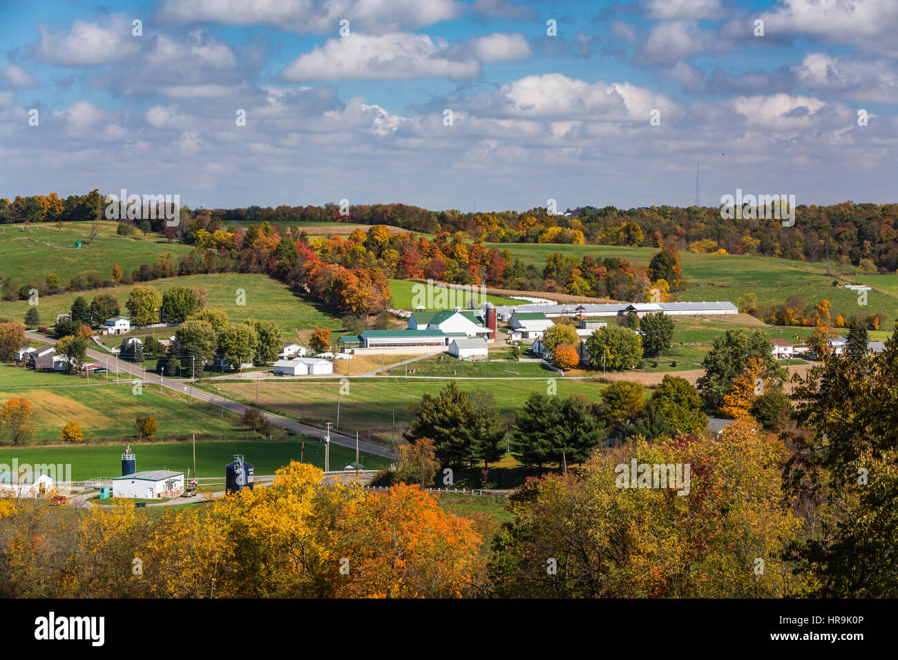 Amish farms in a valley with fall foliage color near Walnut Creek, Ohio ...