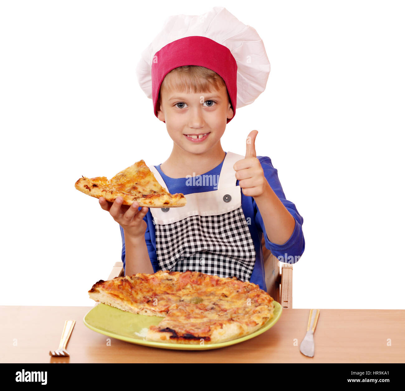 happy boy chef with pizza and thumb up Stock Photo - Alamy