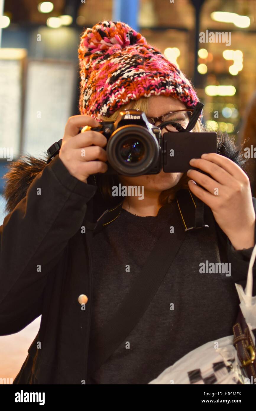 Lady taking photo Stock Photo - Alamy