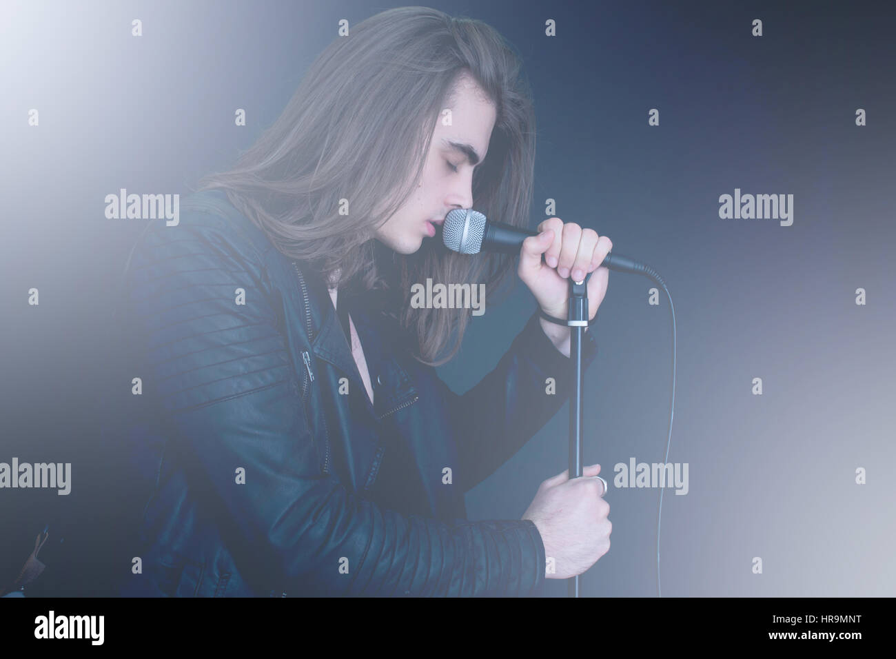Long hair rocker hi-res stock photography and images - Alamy