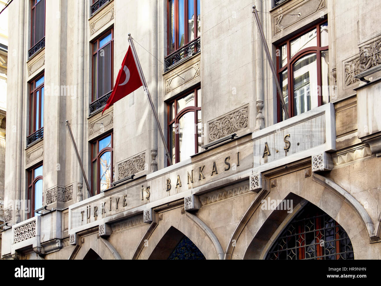 Signage of one of the oldest banks in Turkey with Turkish flag waves ...