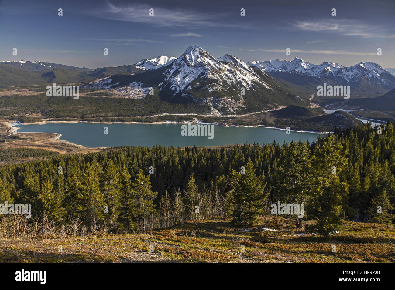 Aerial Springtime View of Barrier Lake and Distant Snowcapped Mountain ...