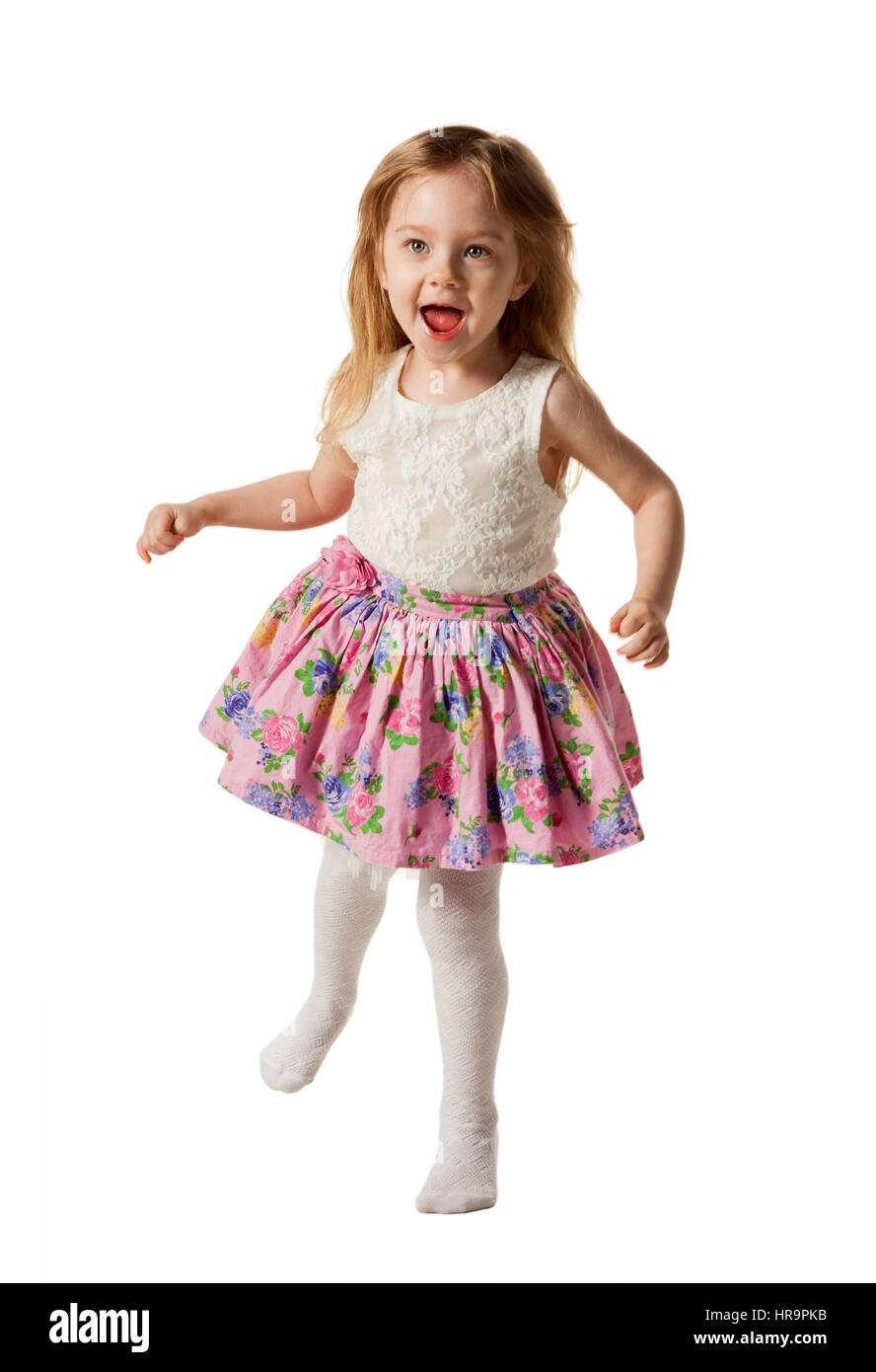 Little cute girl jumping, running, dancing, having fun. Isolated on ...