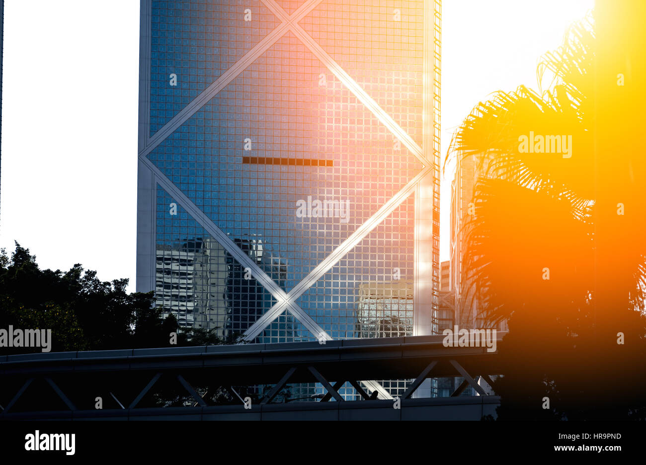 Modern office building close up in sunlight Stock Photo - Alamy