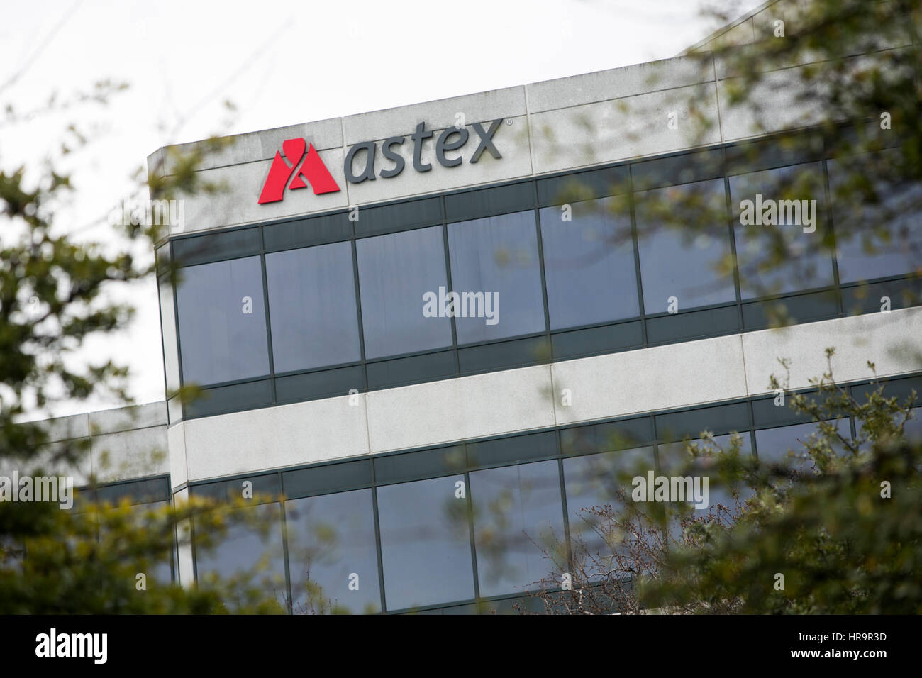 A logo sign outside of the headquarters of Astex Pharmaceuticals in ...