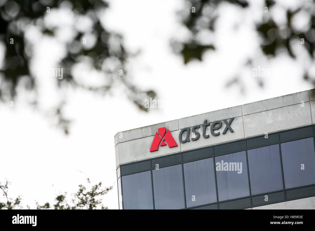 A logo sign outside of the headquarters of Astex Pharmaceuticals in ...