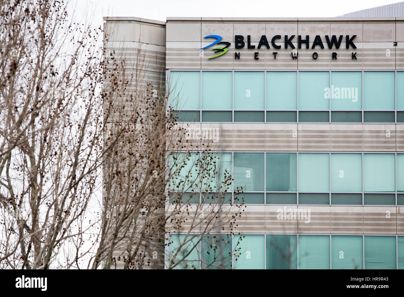 A logo sign outside of the headquarters of Blackhawk Network Holdings ...