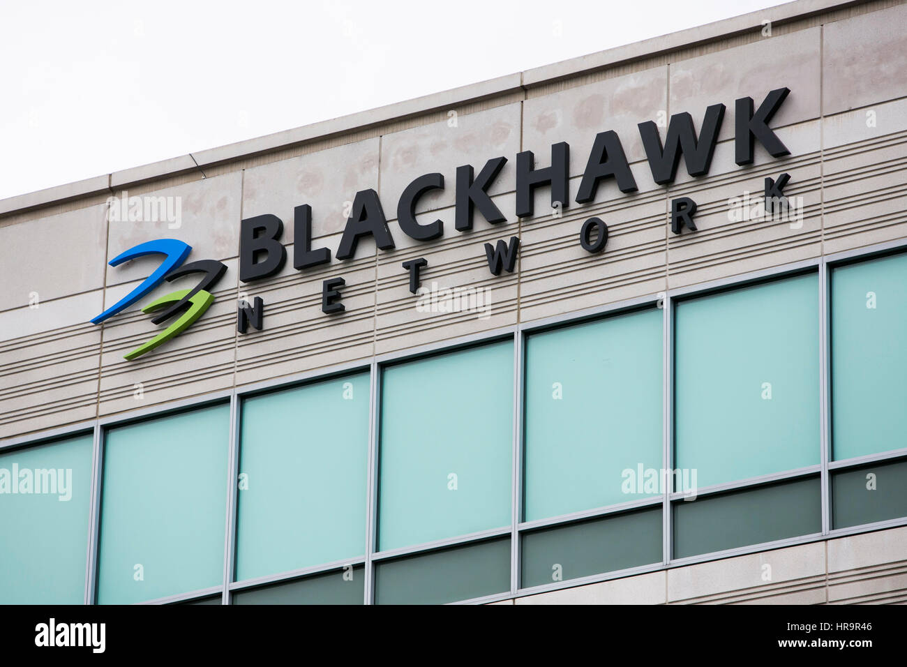 A logo sign outside of the headquarters of Blackhawk Network Holdings ...