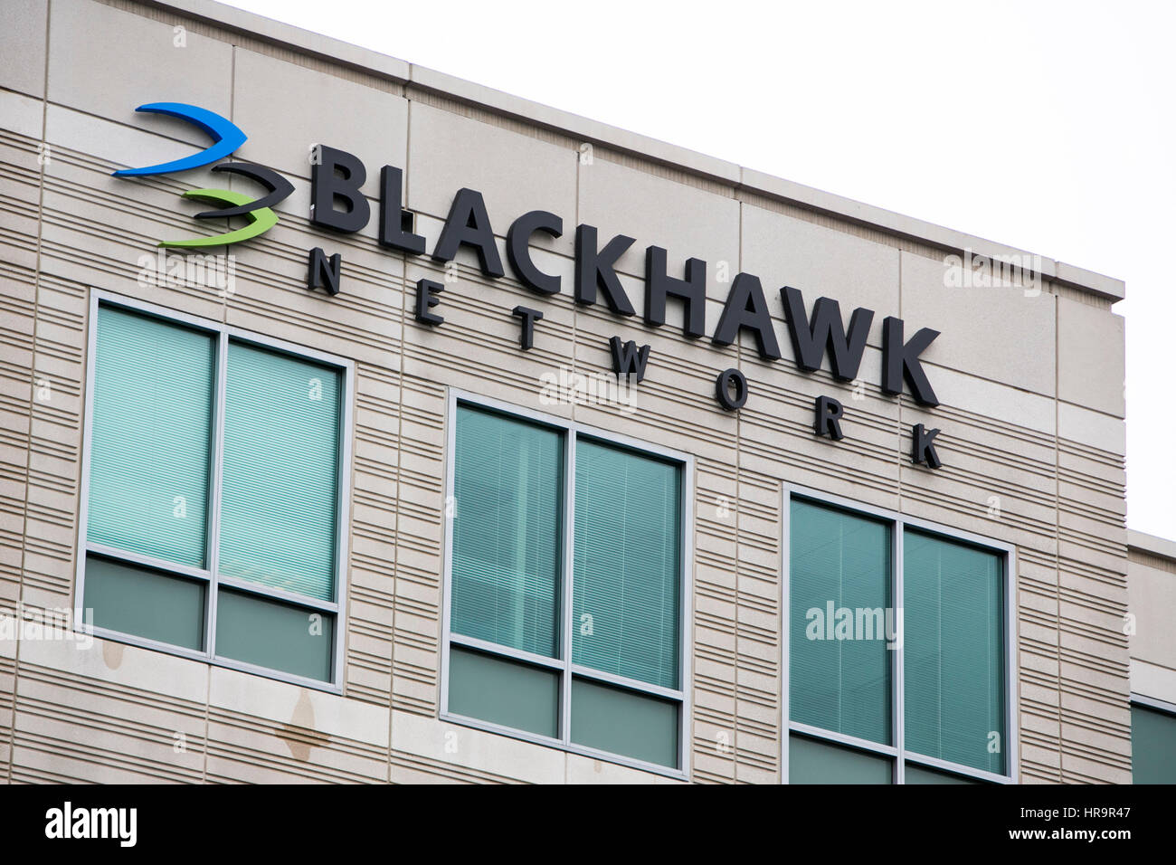 A logo sign outside of the headquarters of Blackhawk Network Holdings ...