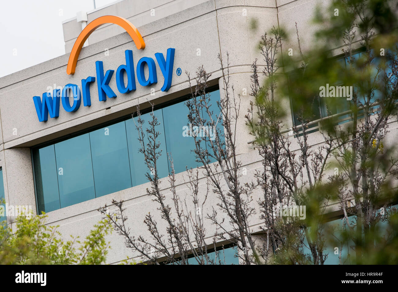 A logo sign outside of the headquarters of Workday, Inc., in Pleasanton ...